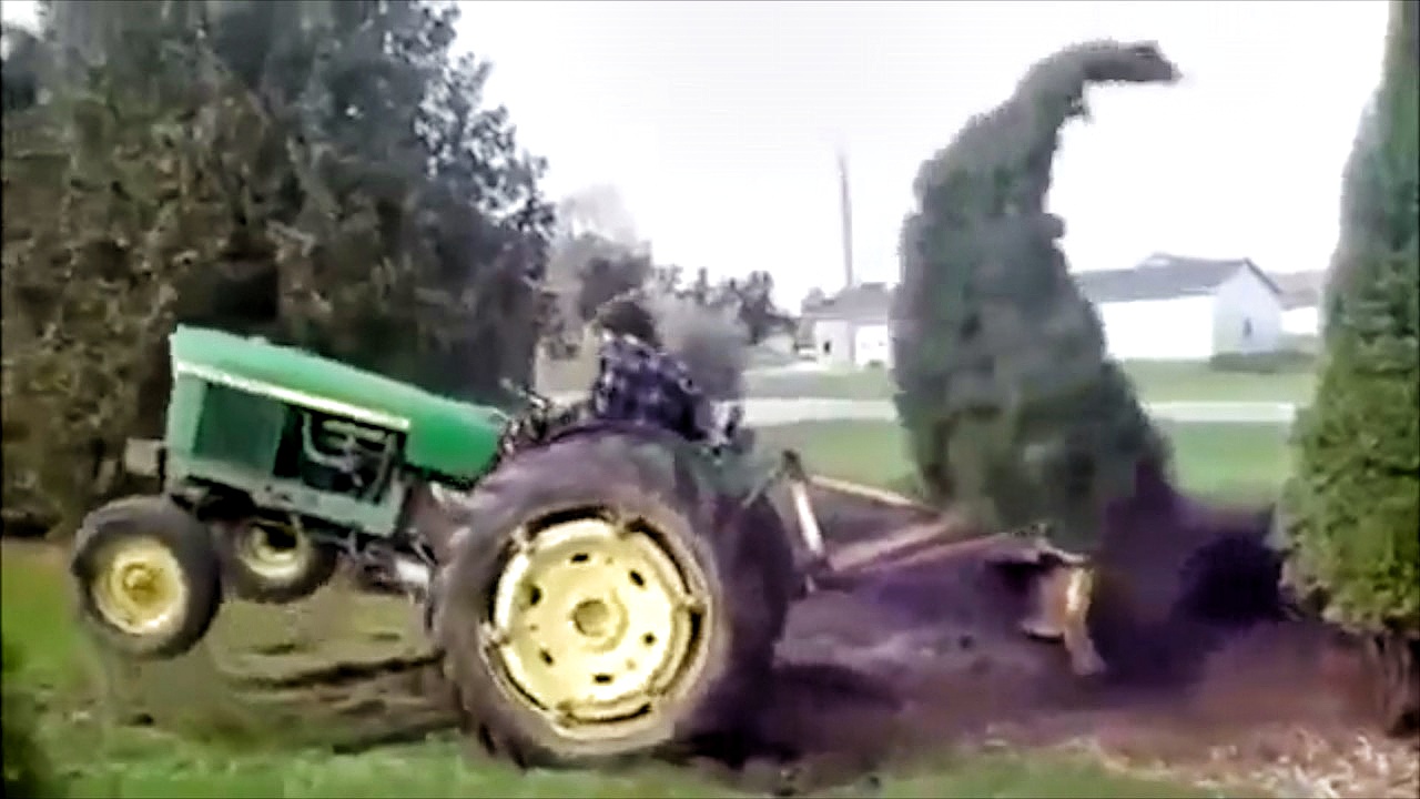 The Big Show - Video of the Day - Tractor Dude Versus Evil Tree